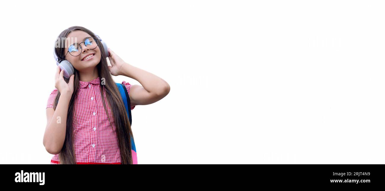 childhood online education. teen girl in modern headphones. online ...