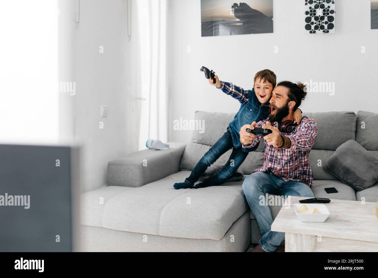 Home entertainment children fun together hi-res stock photography and ...