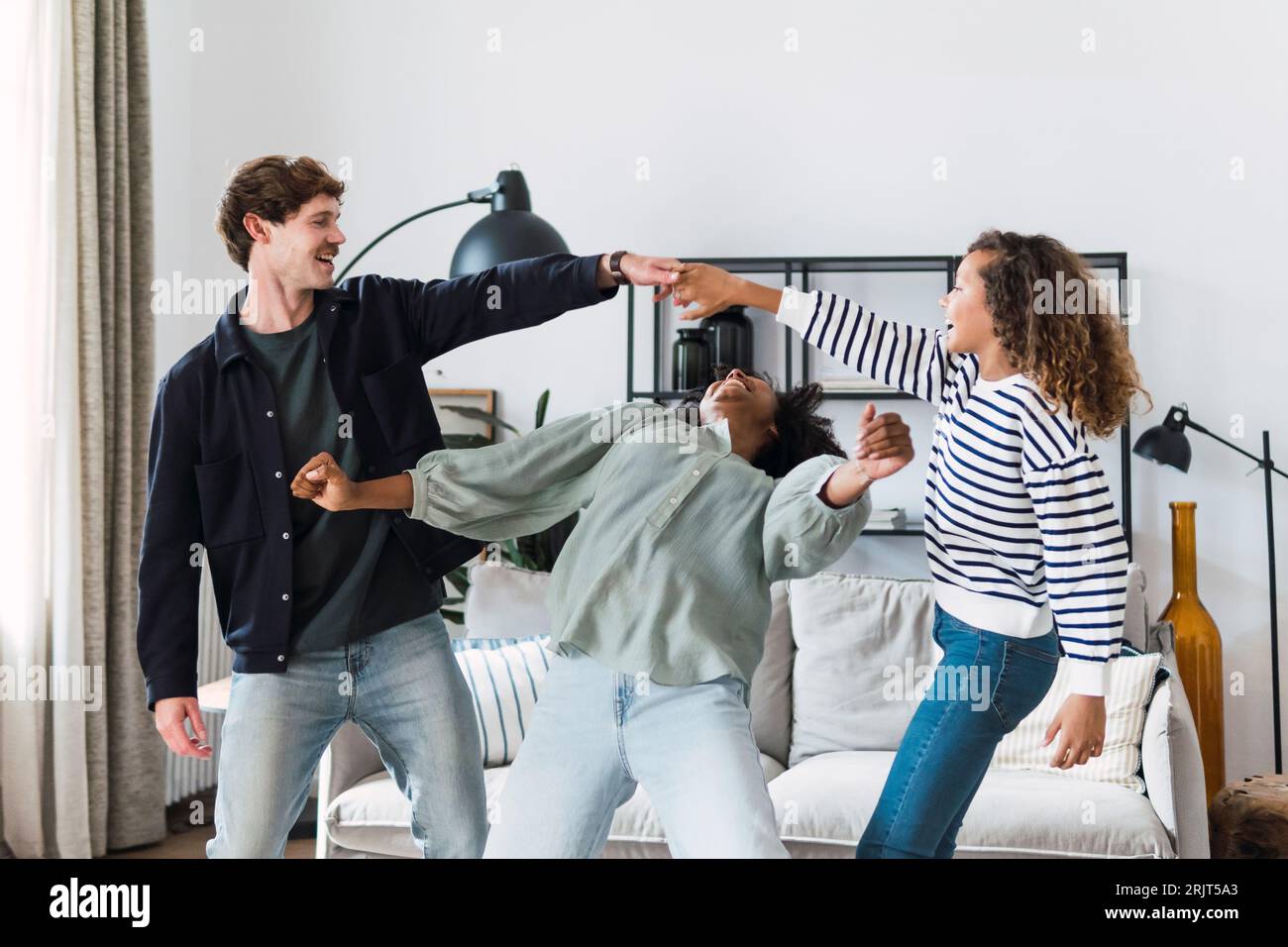 Man woman children dancing home hi-res stock photography and images - Alamy