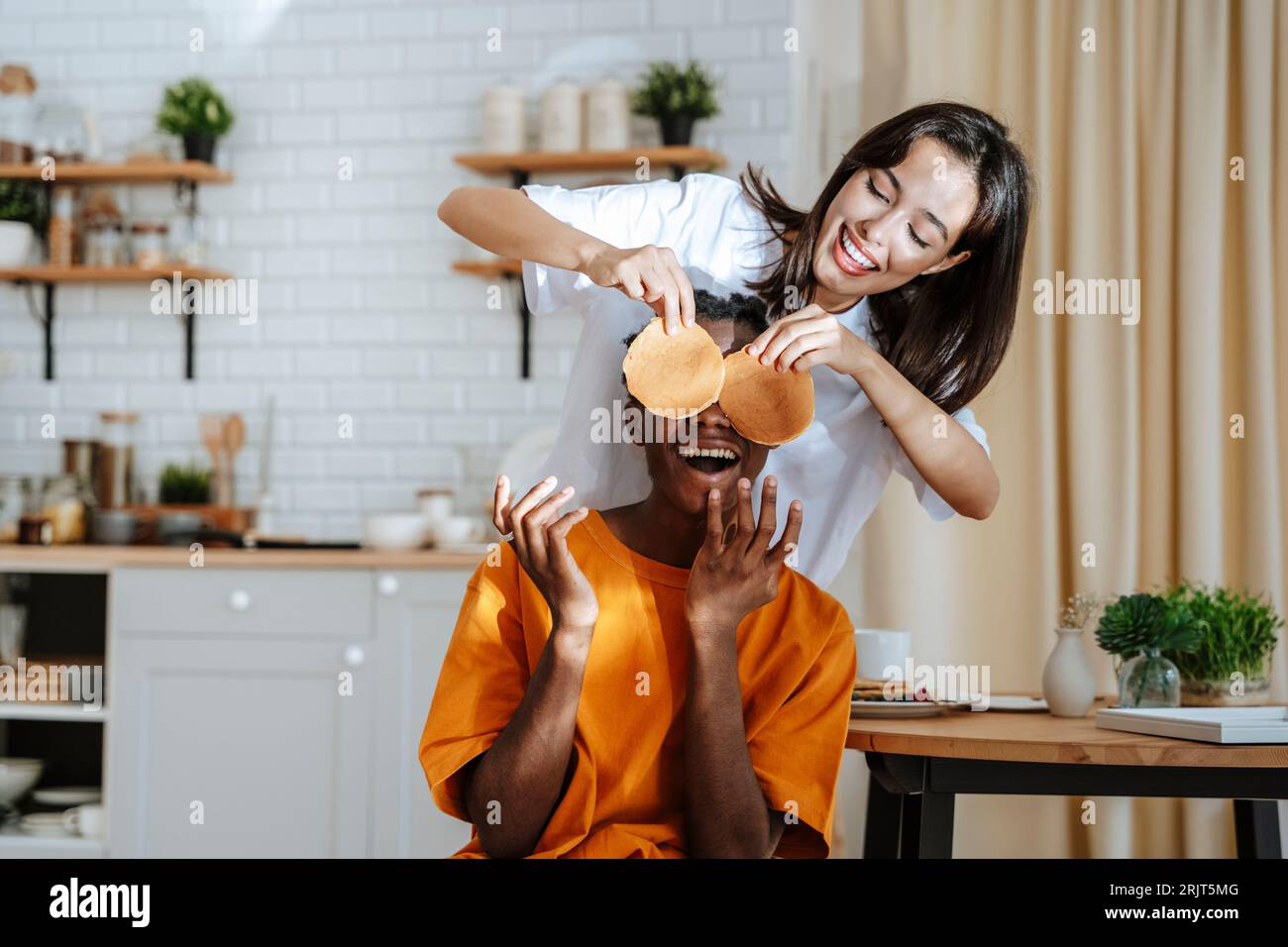 Happy girlfriend playing boyfriends hi-res stock photography and images ...