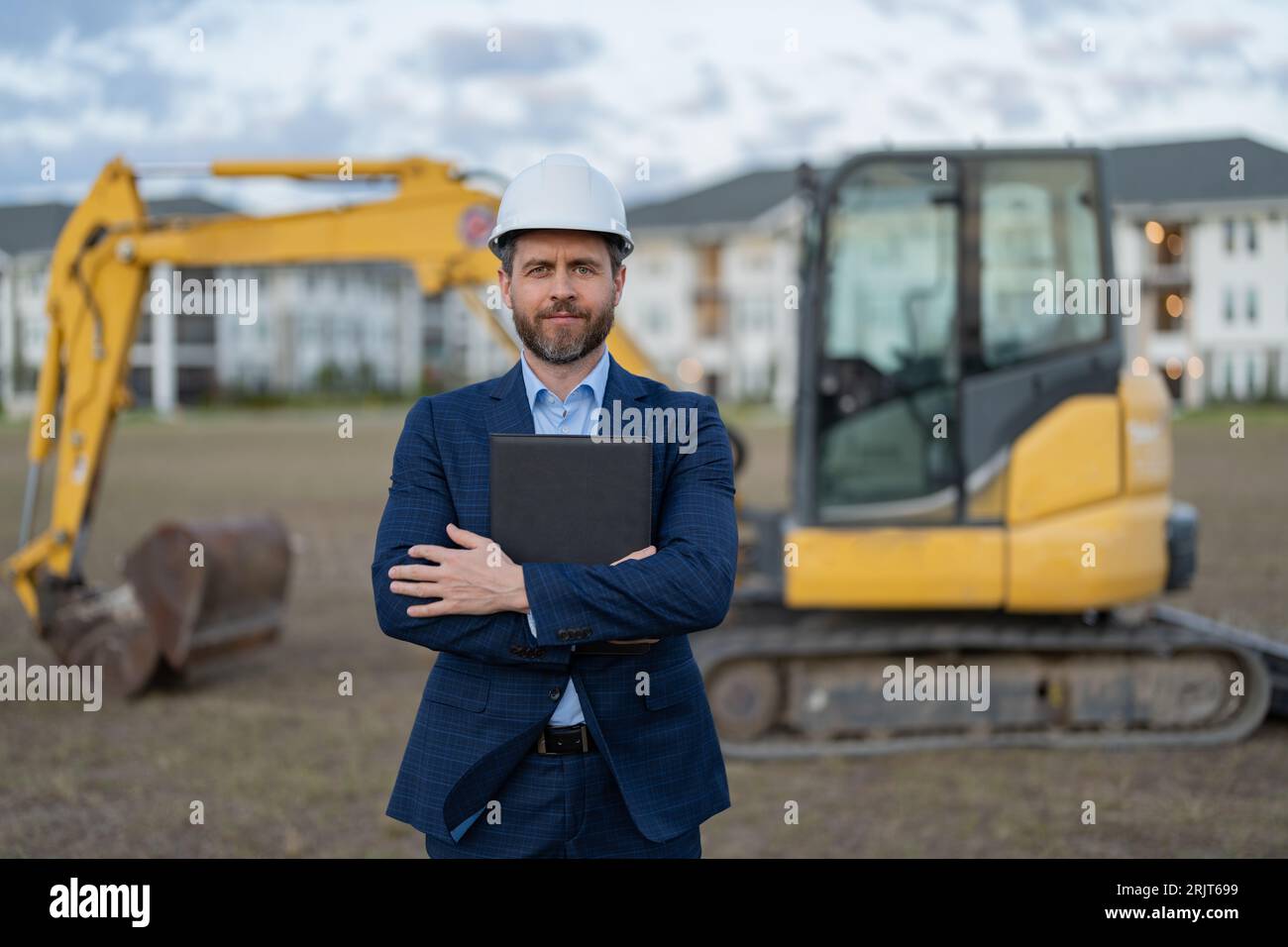 confident construction inspector engineer architecting at site ...