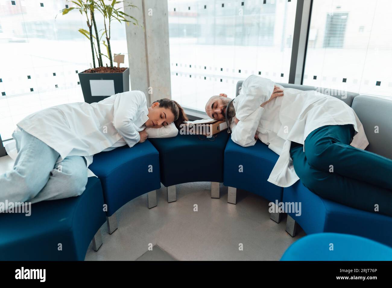 Doctors sleeping on sofa in hospital Stock Photo - Alamy