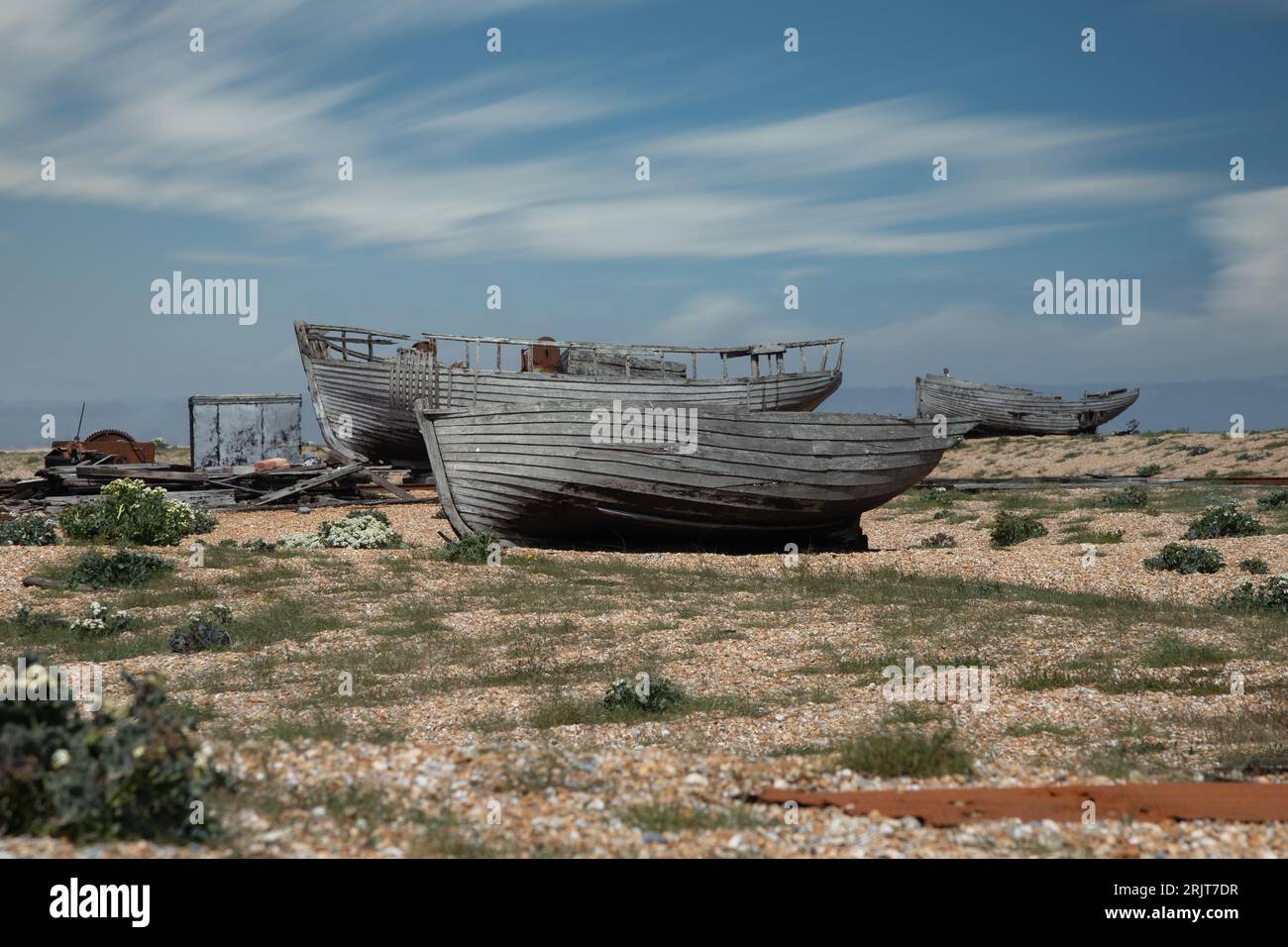 A side view of the old, abandoned ships stranded on the Dungeness beach ...