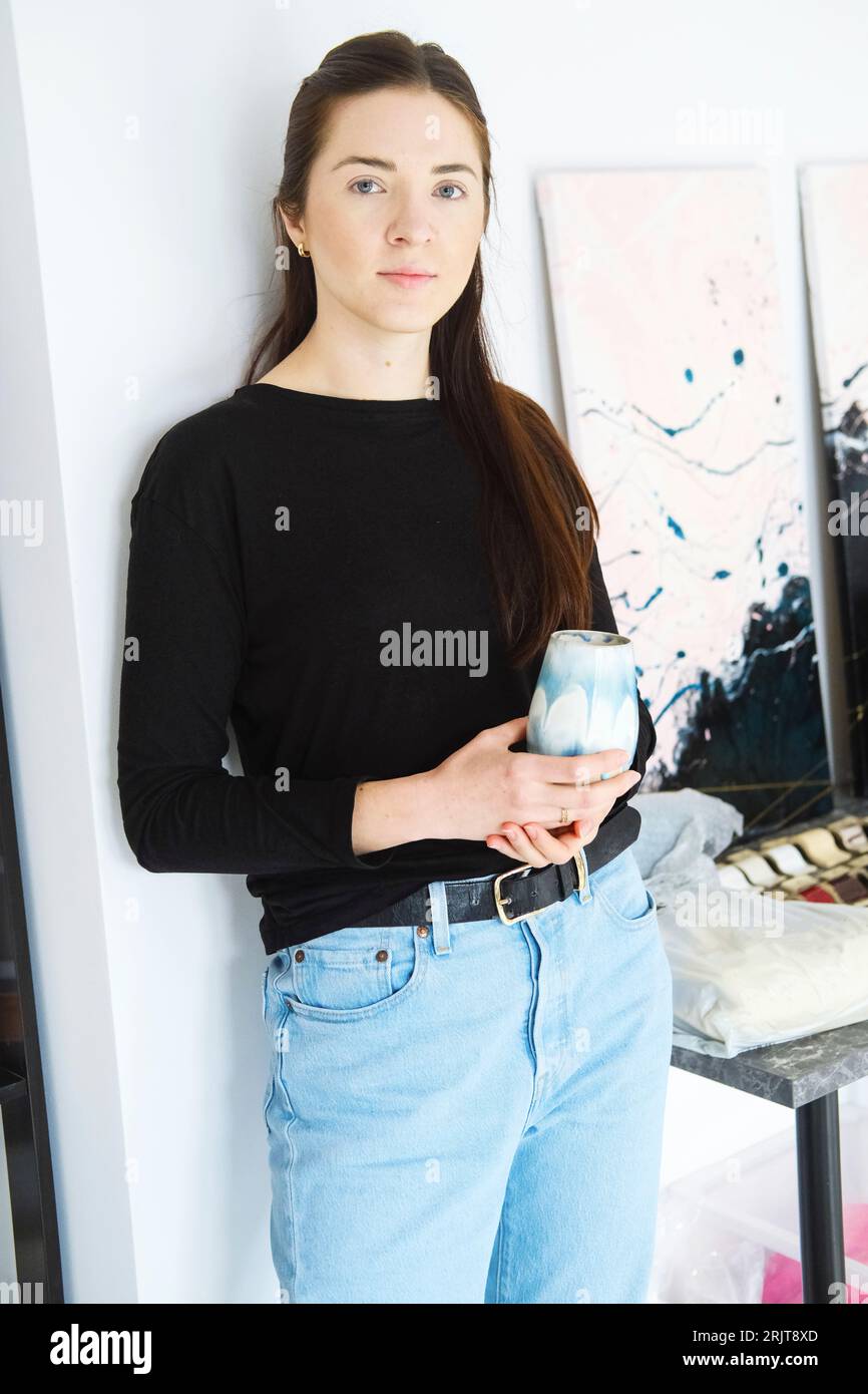 Professional artist holding camera hi-res stock photography and images ...