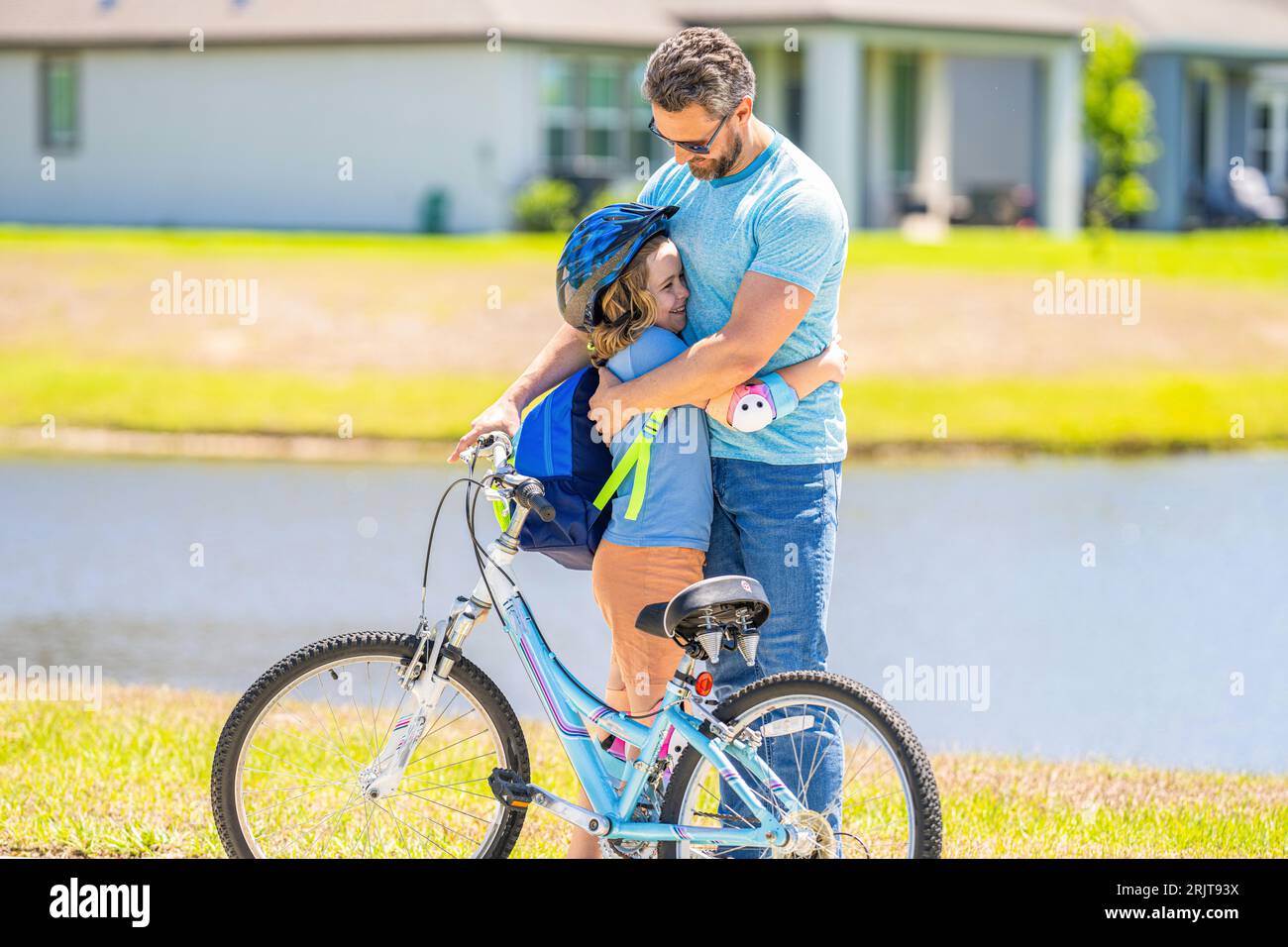 active father setting a example for fathers son. fathers parenting with ...