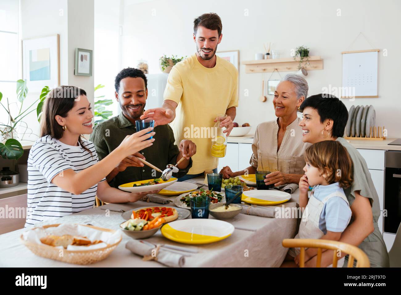 Family lunch grandparents children hi-res stock photography and images ...