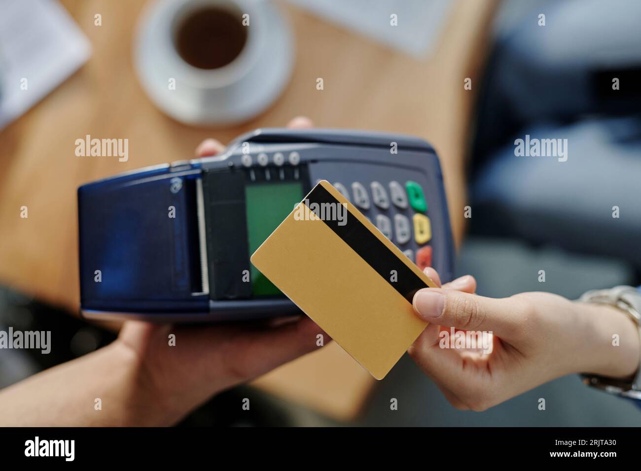 Woman card hand pay hi-res stock photography and images - Alamy