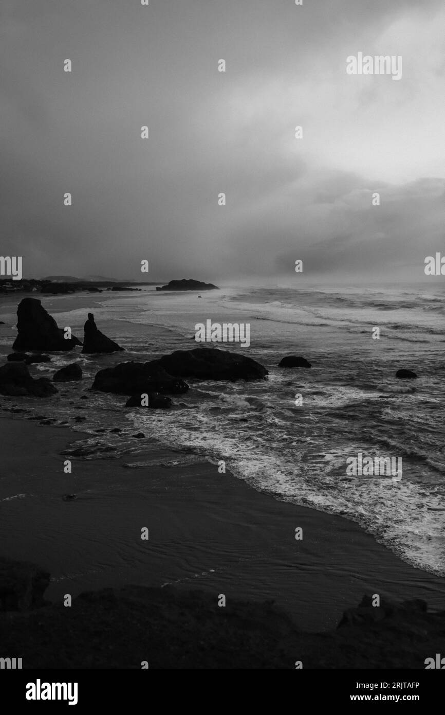 A grayscale of the sunset on the Pacific Coast Highway Stock Photo - Alamy