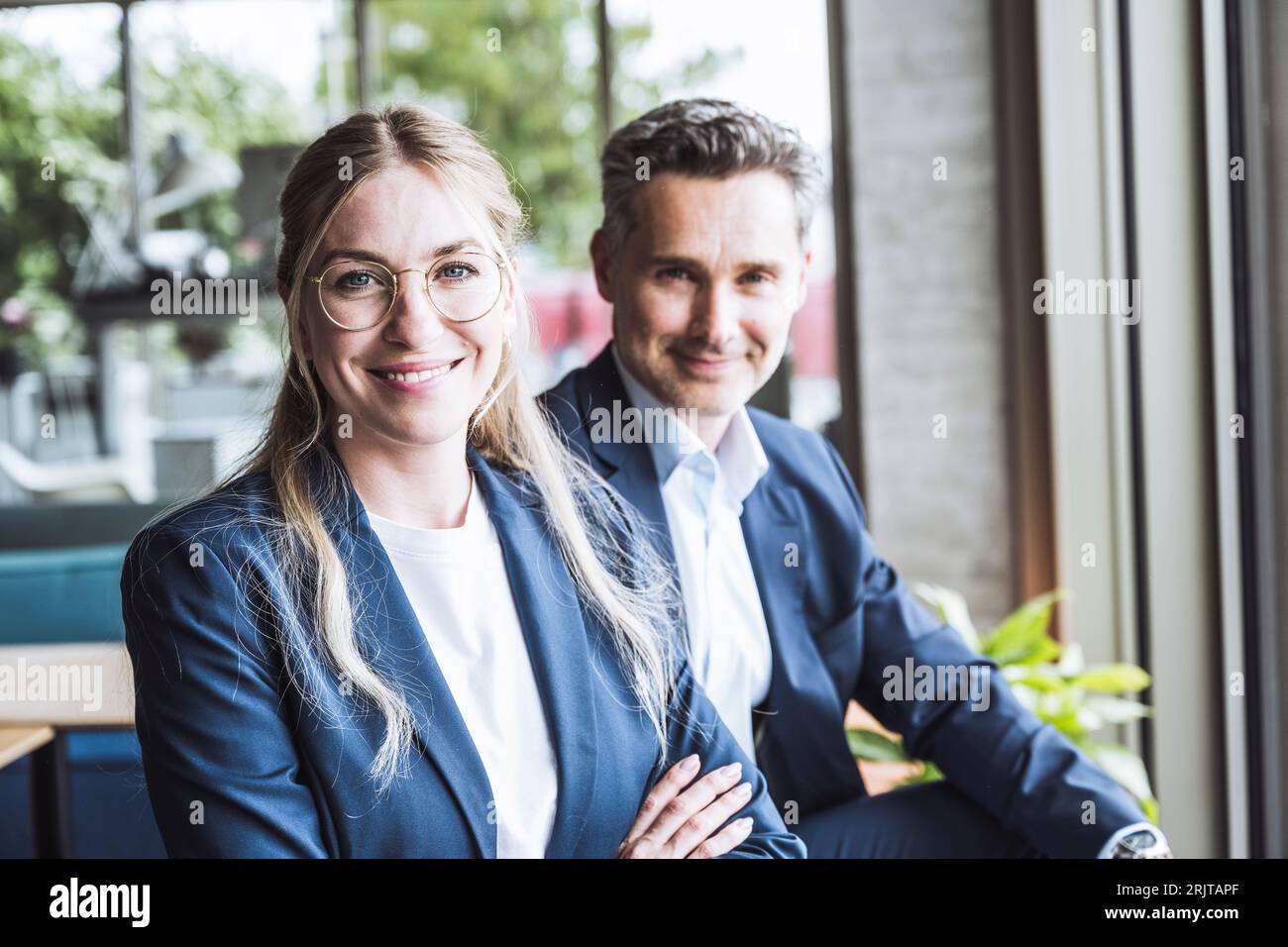 Business people smiling camera together hi-res stock photography and ...