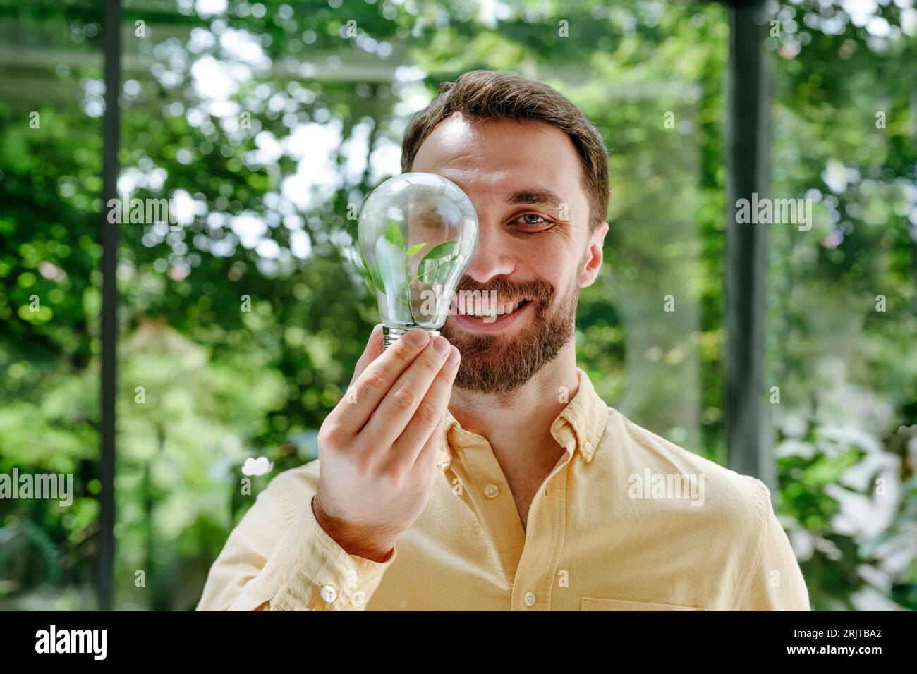 Happy businessman light bulb hi-res stock photography and images - Alamy