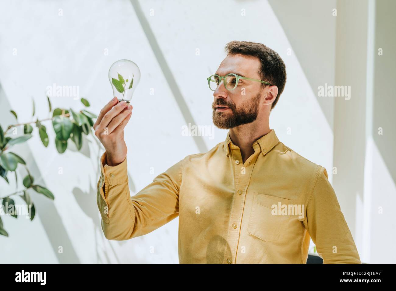 Businessman light bulb in hi-res stock photography and images - Alamy