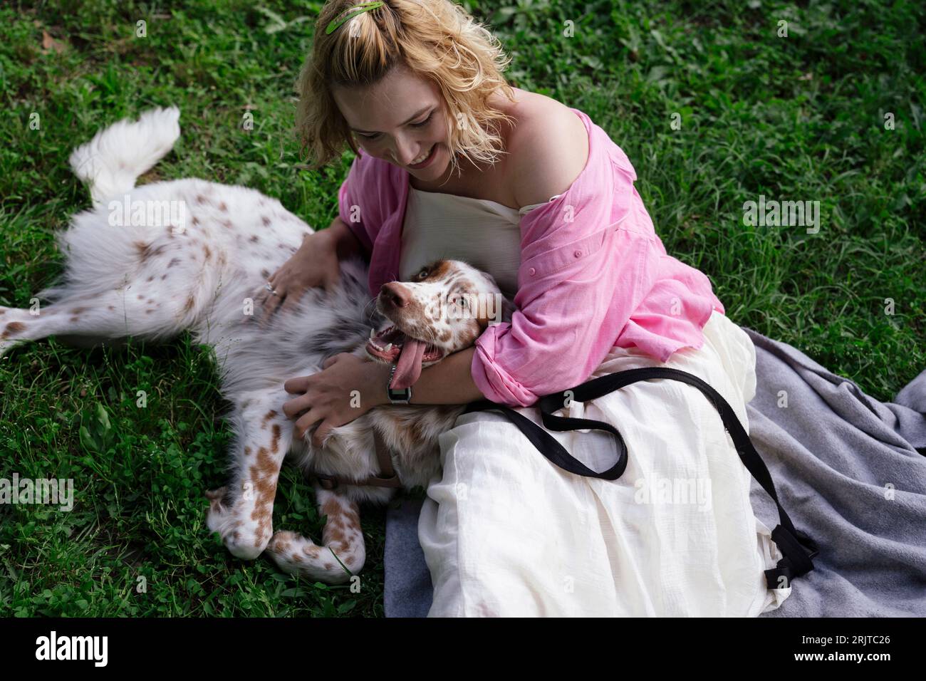 Woman dog picnic in hi-res stock photography and images - Alamy