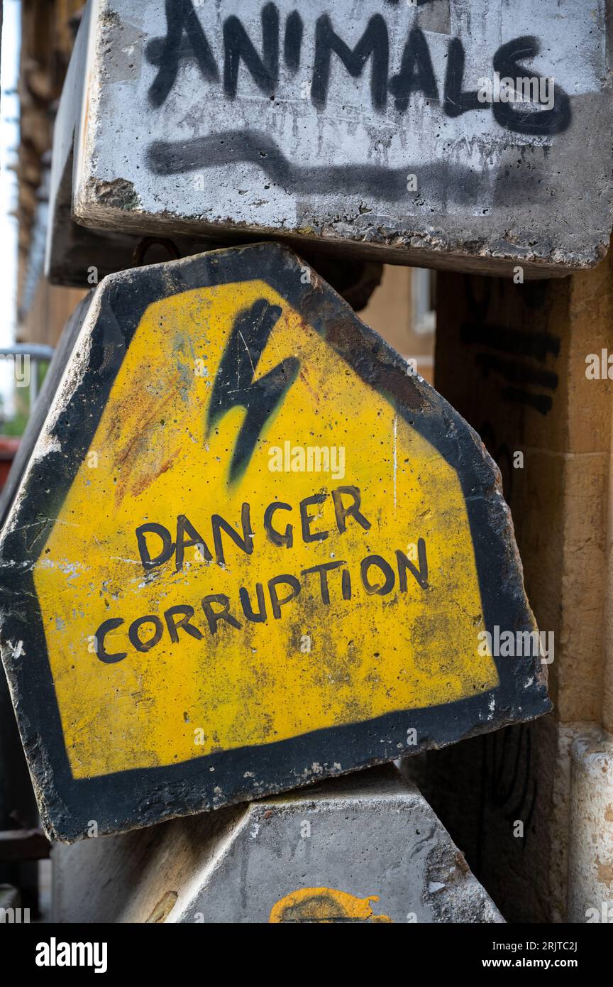 A vertical closeup shot of an activism sign against corruption Stock ...