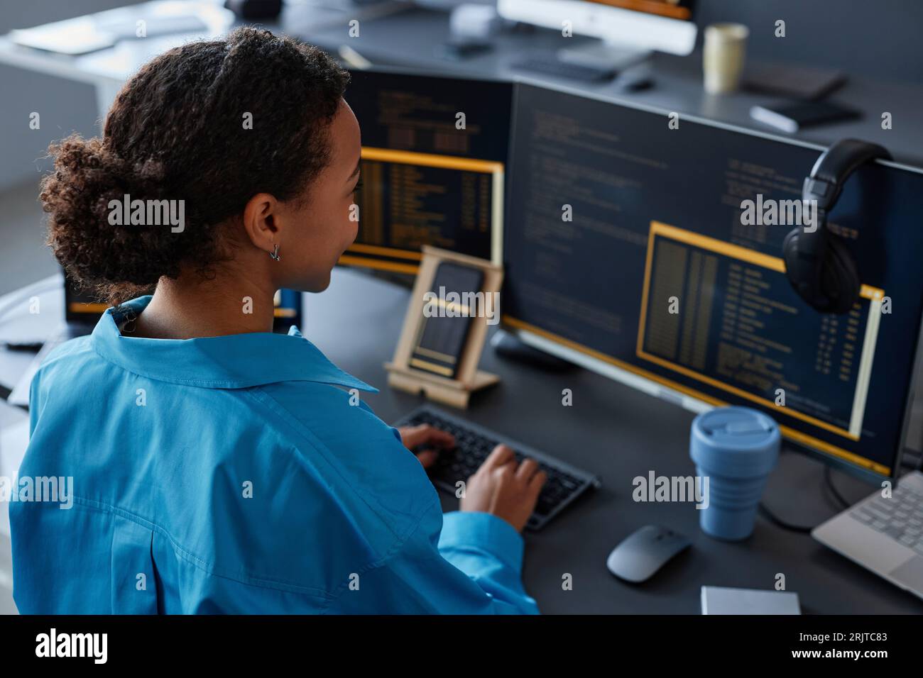 Computer programmer working on desktop PC in office Stock Photo - Alamy Computer programmer working on desktop PC in office Stock Photo - Alamy