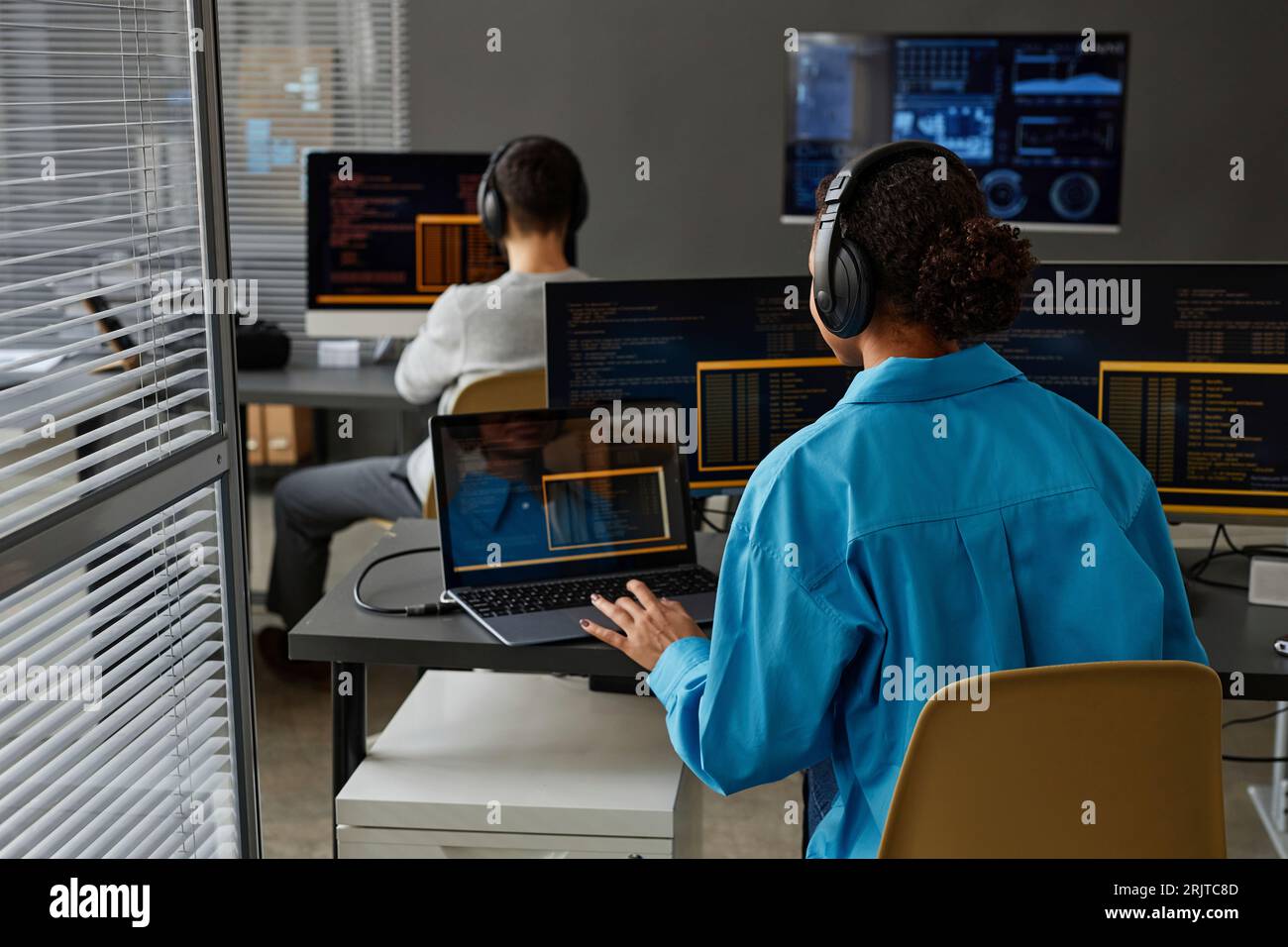 Male colleague typing desktop female hi-res stock photography and ...
