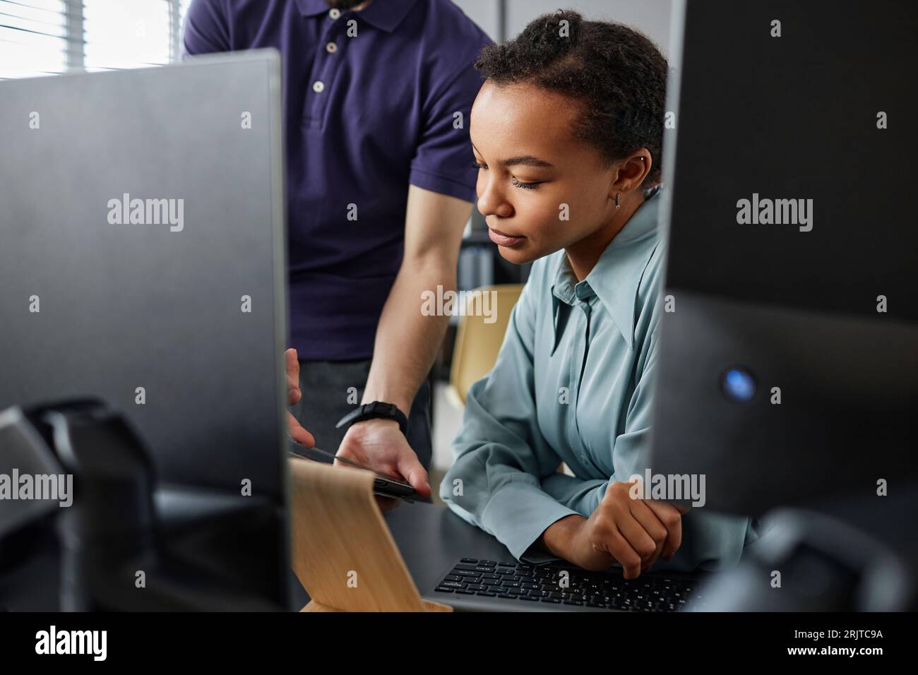Female programmer colleague working hi-res stock photography and images ...