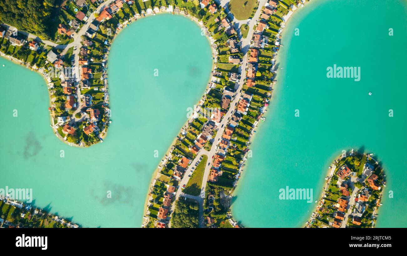 A vibrant townscape featuring a variety of buildings and homes located ...