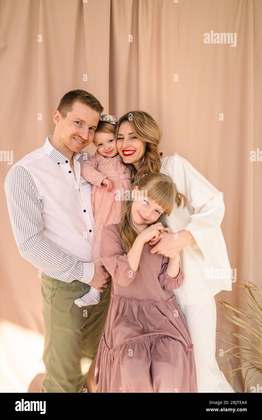 happy family of four father with mother and two daughters Stock Photo ...
