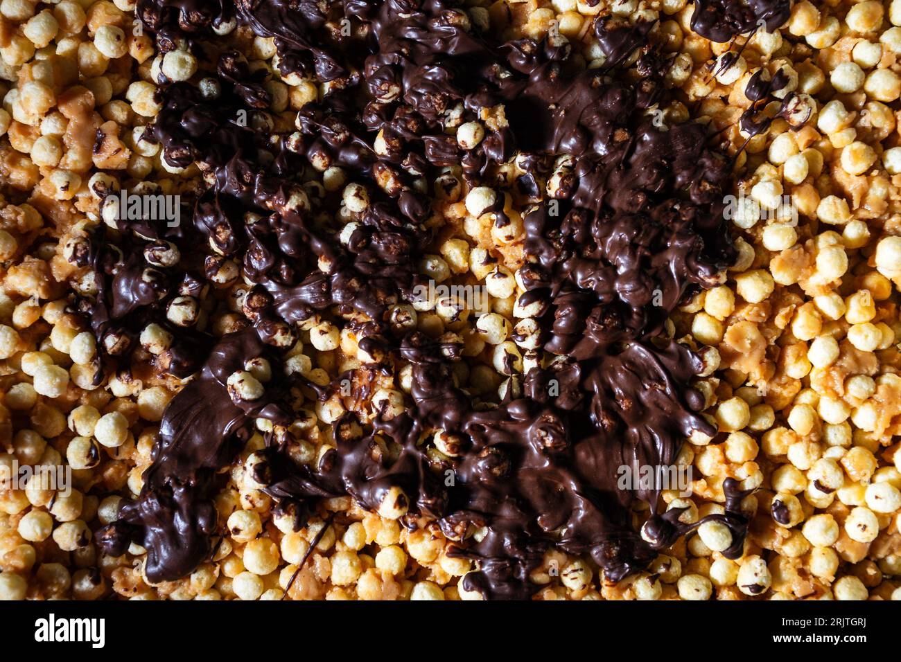 Top view of a homemade preparation of quinoa pop beans with chocolate ...
