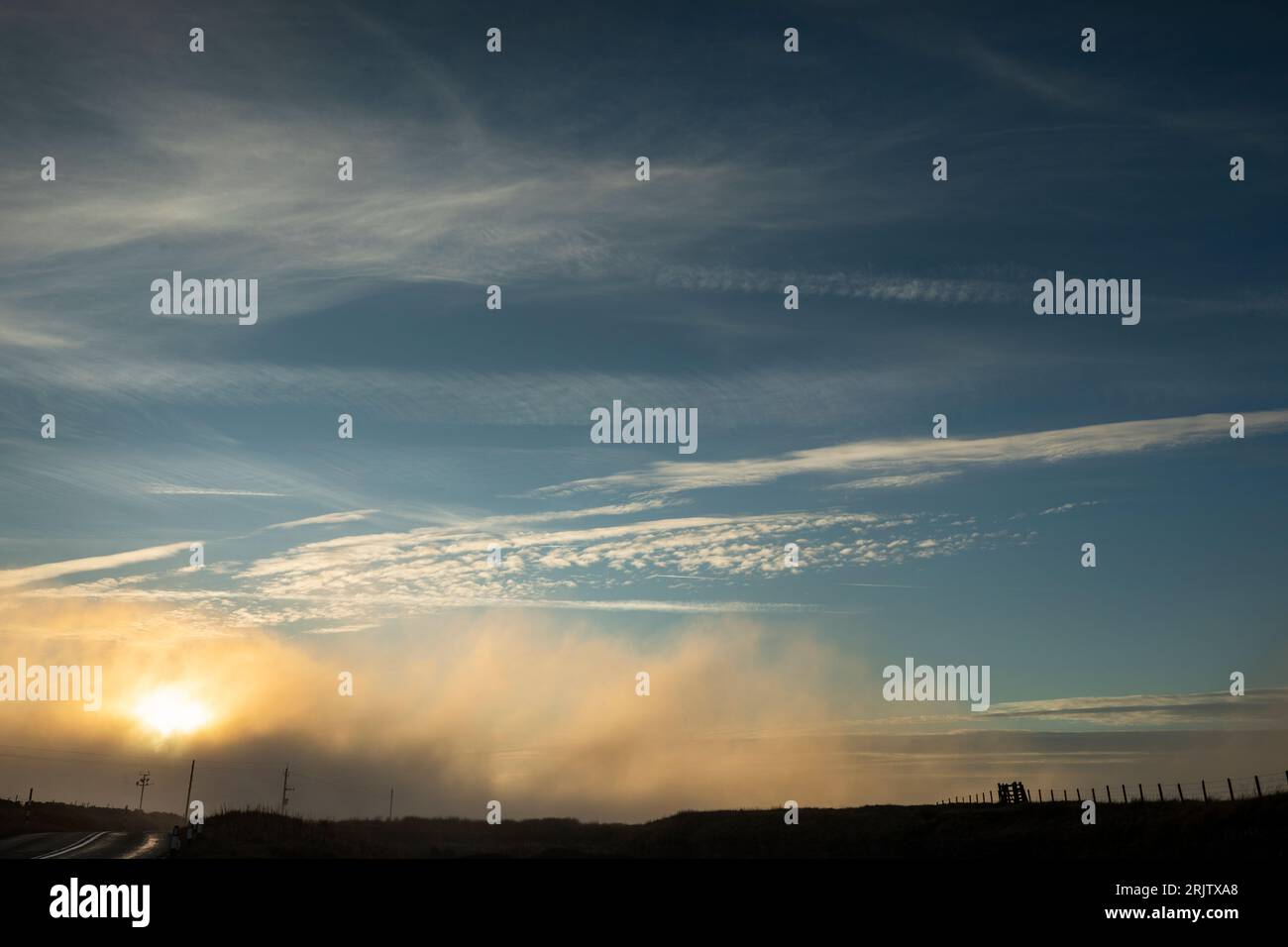 Clear sky and sun above fog on Hartside summit in the North Pennines ...