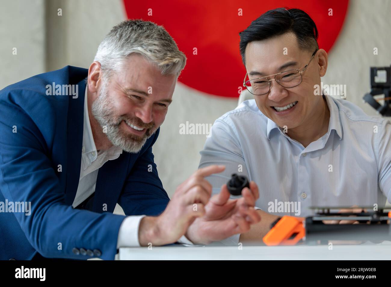 Innovative industrial engineers using 3D printer to build complex ...