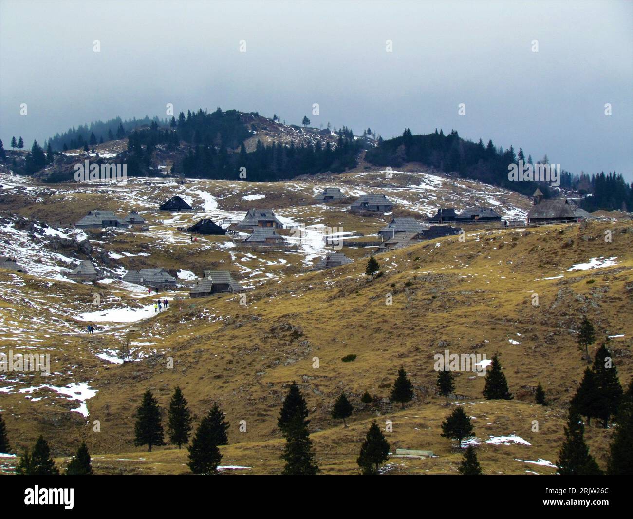 Big Pasture Plateau in Kamnik-Savinja alps in Slovenia with wooden huts ...