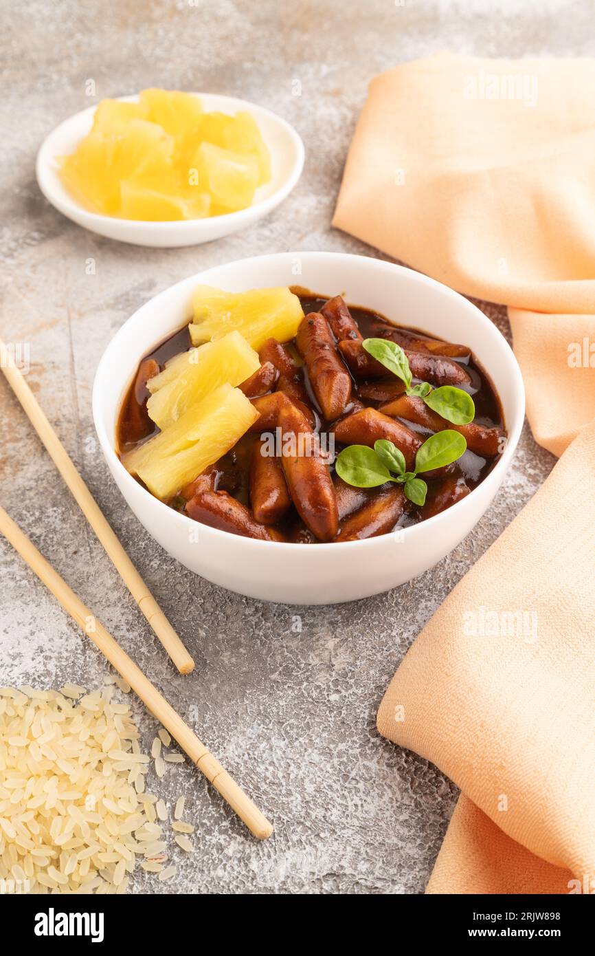 Tteokbokki or Topokki, fried rice cake stick, popular Korean street ...