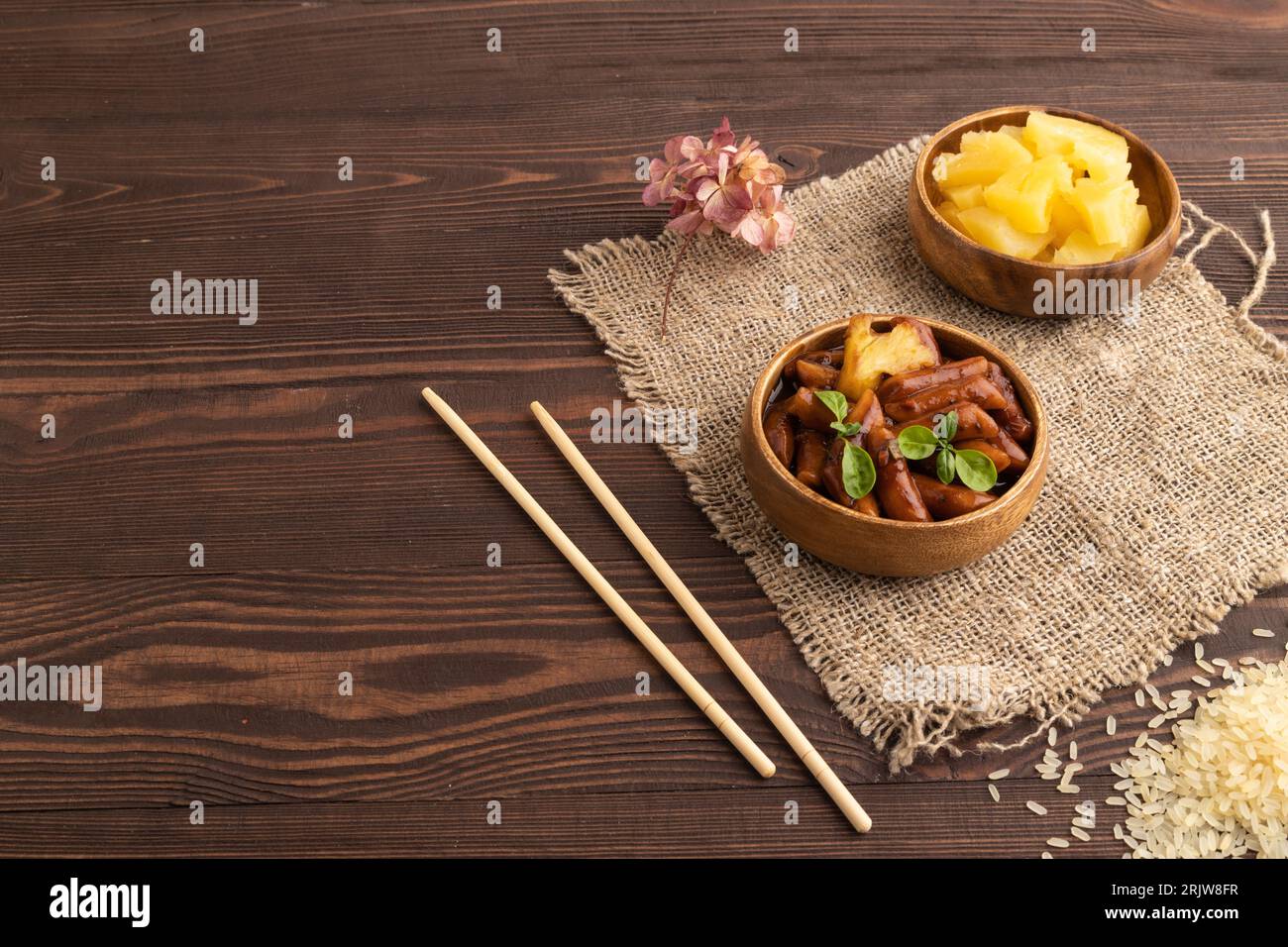 Tteokbokki or Topokki, fried rice cake stick, popular Korean street ...