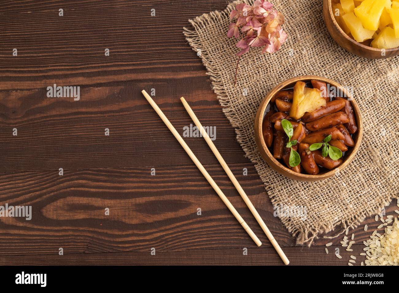 Tteokbokki or Topokki, fried rice cake stick, popular Korean street ...