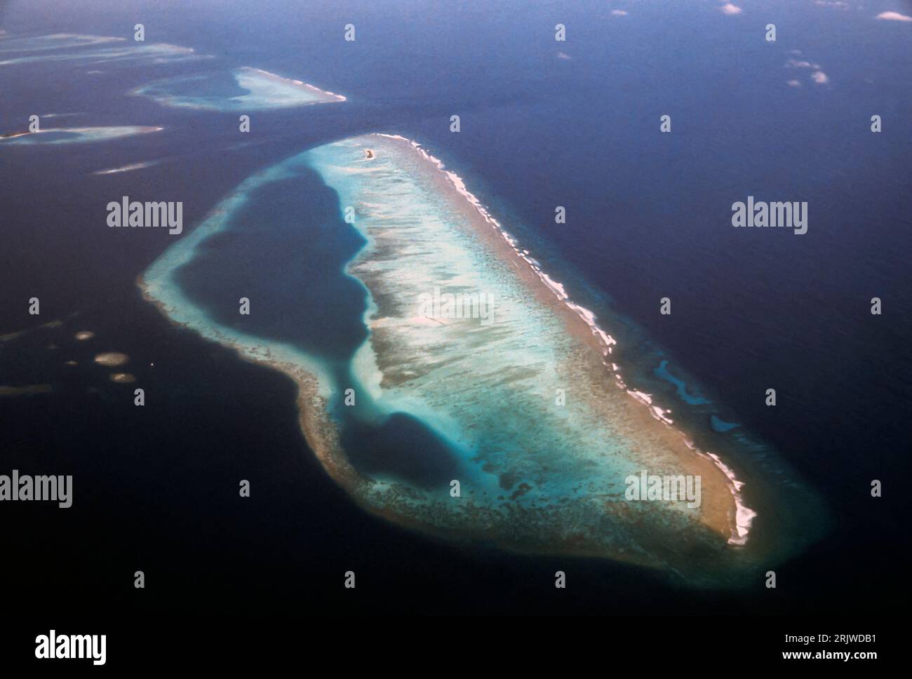 Aerial view of the exposed and leward side of a reef in an atoll in the ...