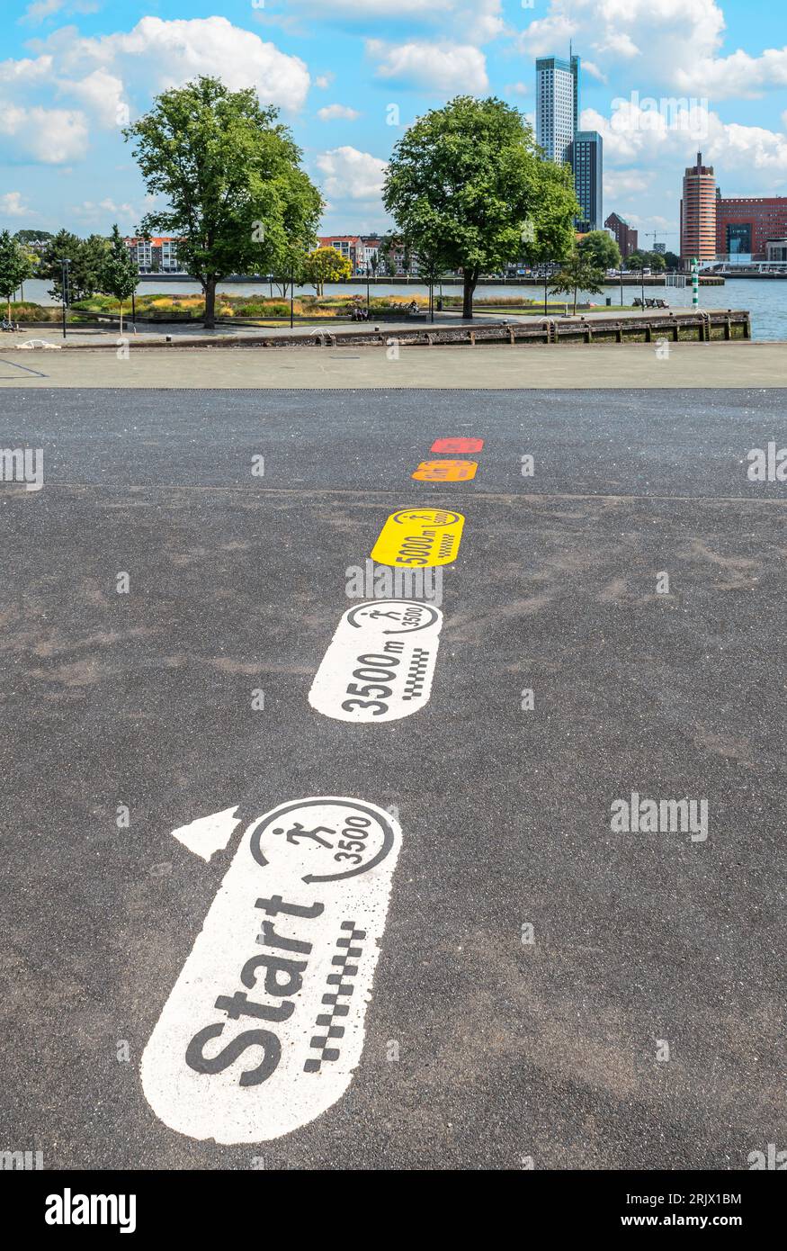 Running trail distance signs on the street in Rotterdam, Netherlands ...