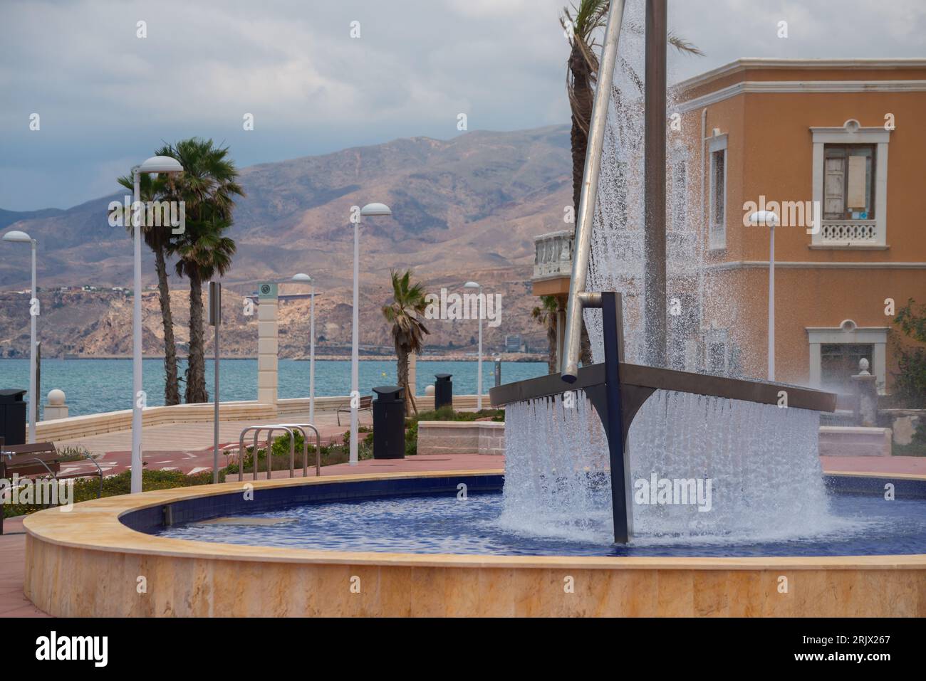 ALMERIA, SPAIN - 24 MAY 2023 A large boat fountain on the promenade ...