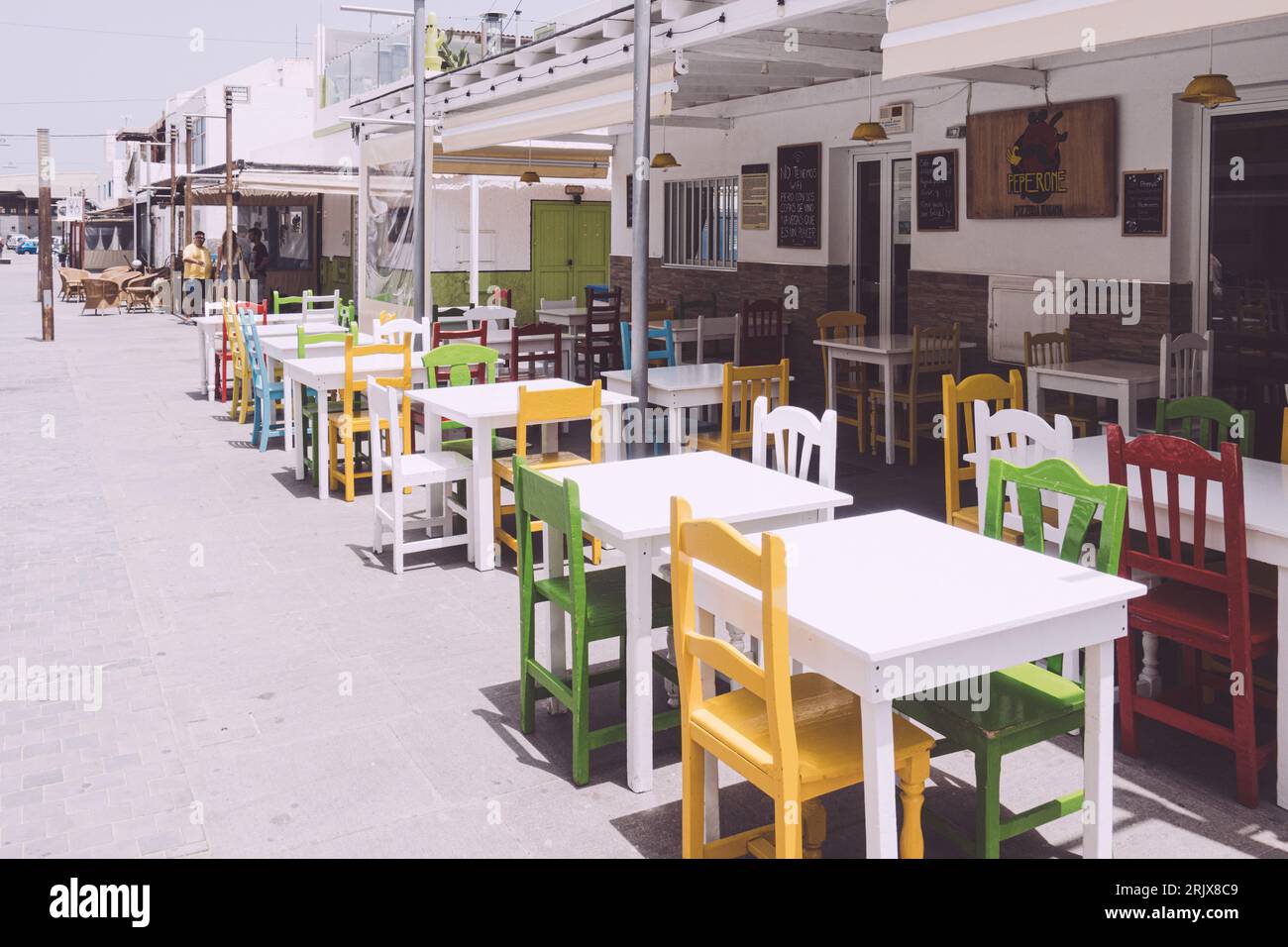 Outside colourful table and chairs hi-res stock photography and images ...