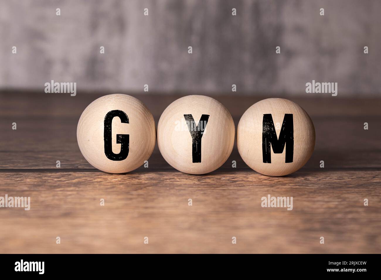 Alphabet letter block in word gym on wood background Stock Photo - Alamy