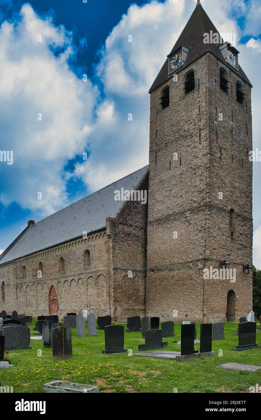 The roman style 12th-century St Agatha Church, with a fortified tower ...