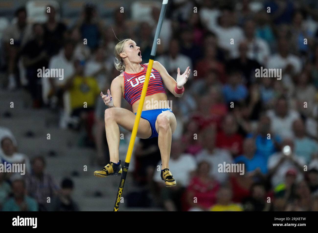 Katie Moon, of the United States, reacts after clearing the bar in an ...