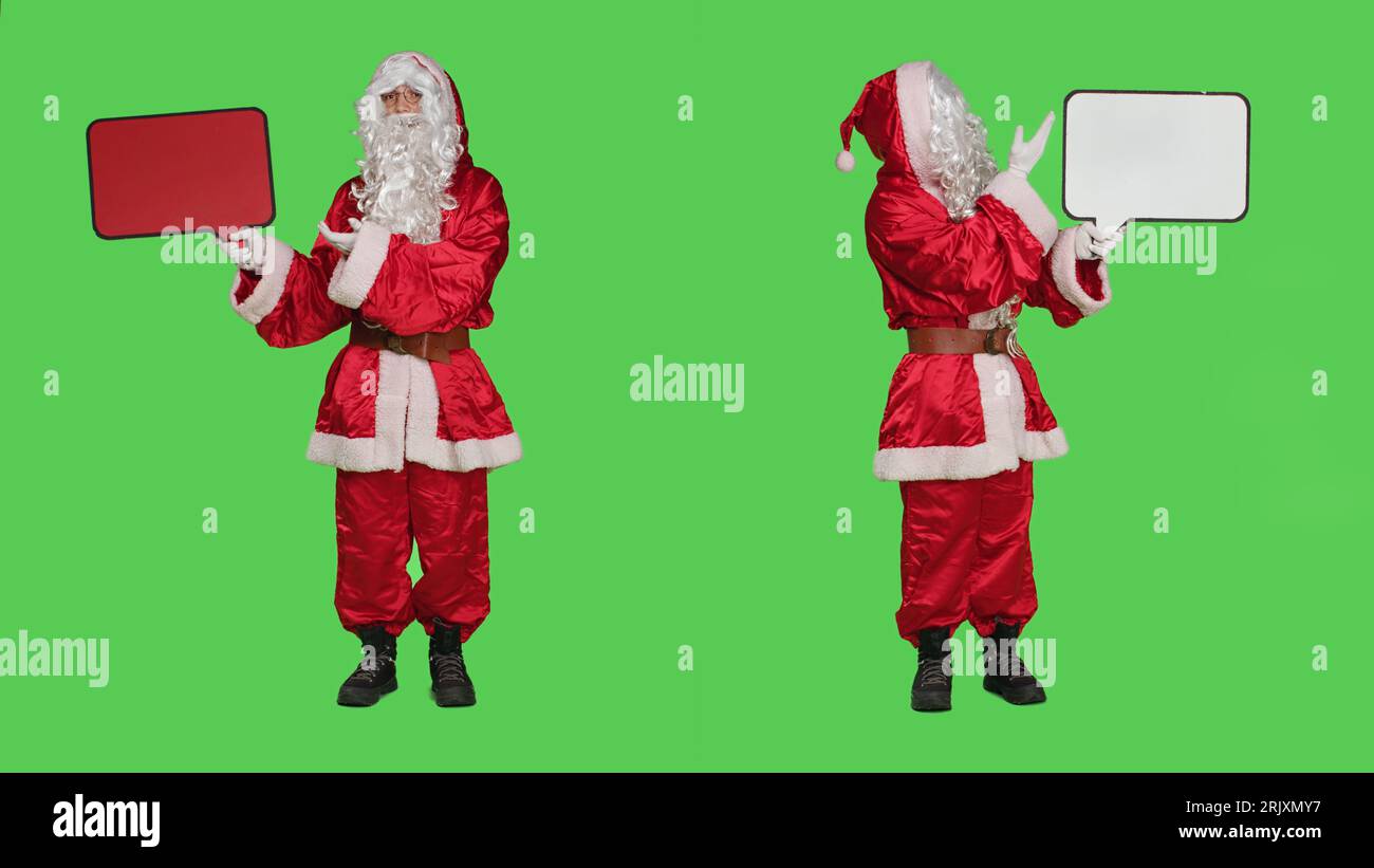 Saint nick holding speech bubble red billboard while he wears festive ...