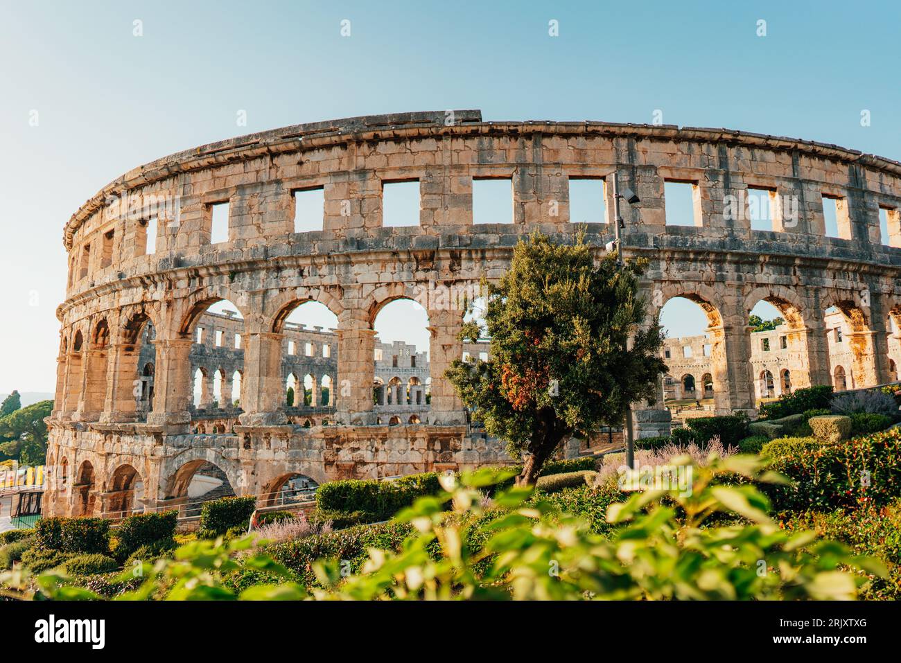 An iconic image of the Colosseum in Rome, Italy, a remarkable example ...