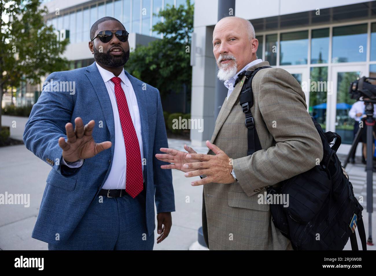Reps. Byron Donalds (R-Fla.) and Chip Roy (R-Texas) are seen outside ...