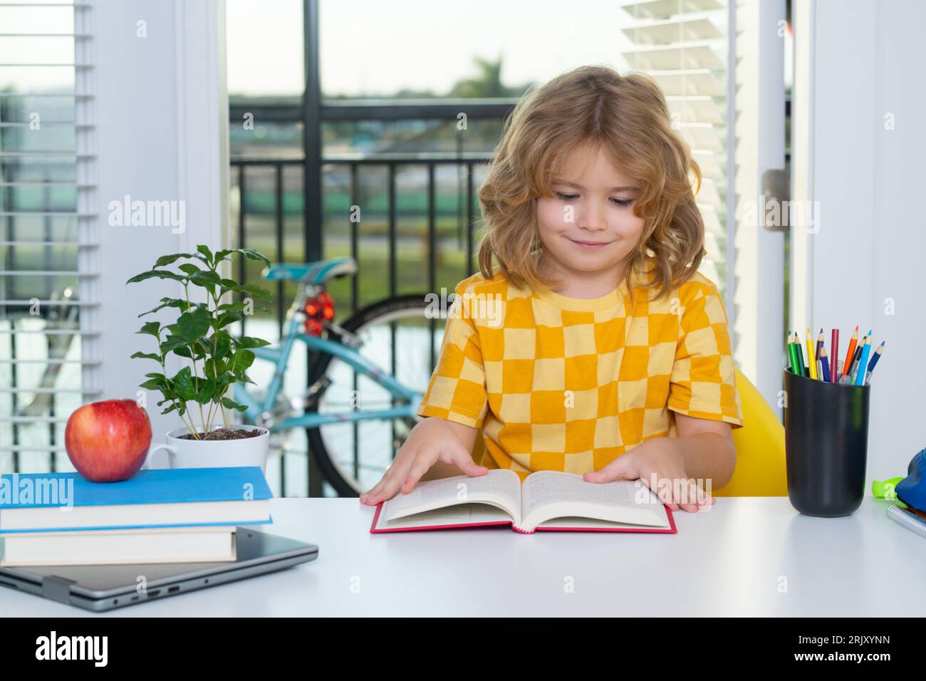 School child studying at home. Kid from elementary school. Child ...