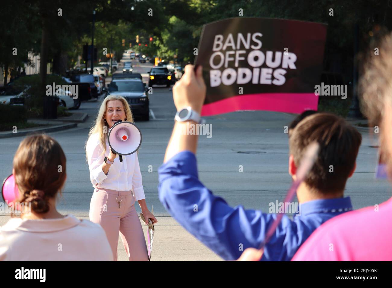 Democratic South Carolina Rep. Beth Bernstein leads chants at an ...