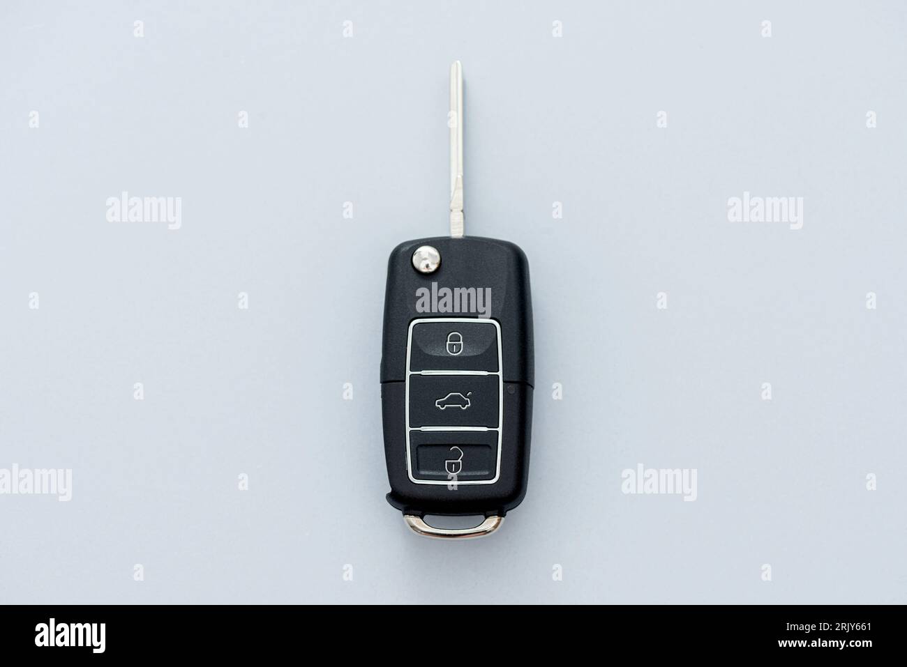 Wireless car key on the blue background Stock Photo - Alamy