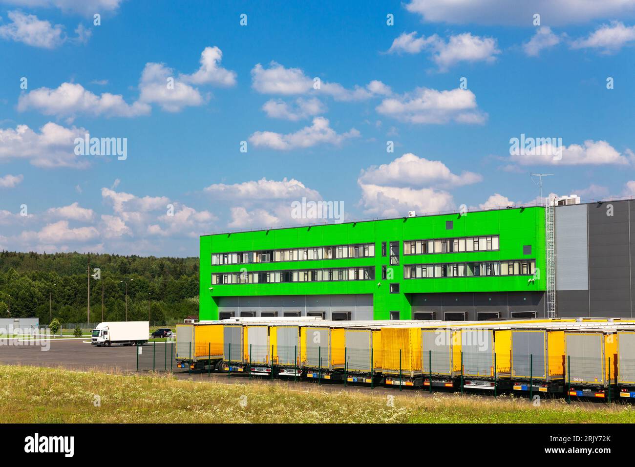 Distribution warehouse with trucks of different capacity ...