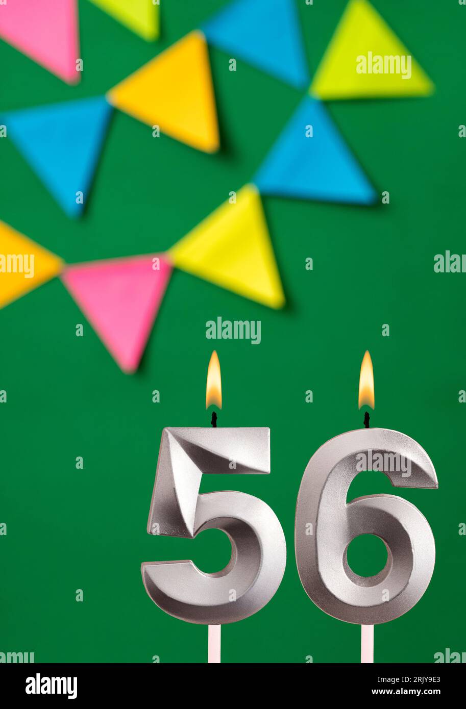 Vertical birthday card with number 56 candle - Green background with ...