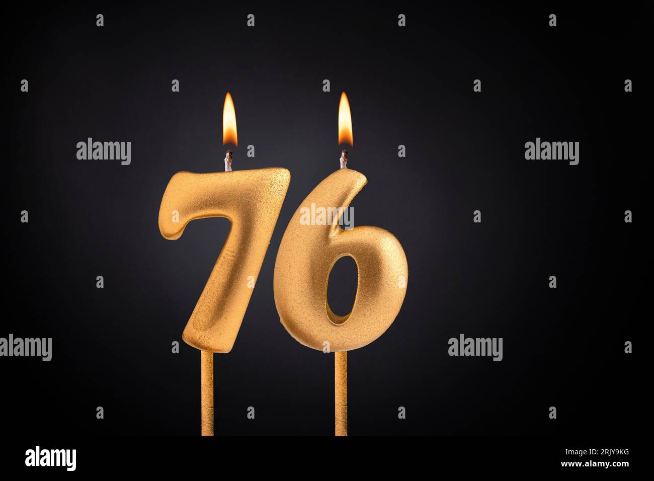 Birthday candle number 76 - Birthday celebration on black background ...