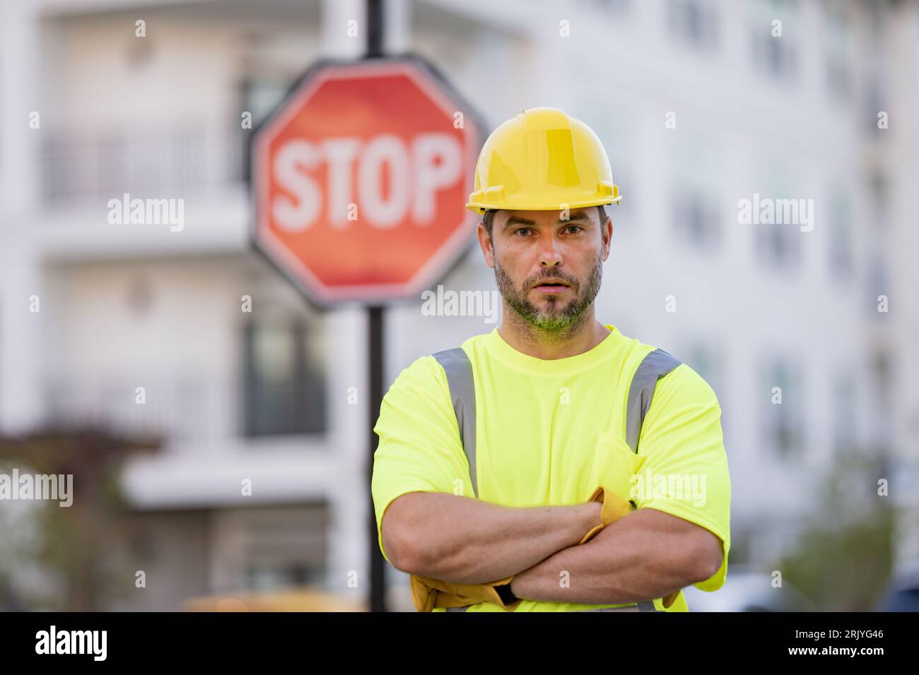 Stop road sign. Builder with stop gesture, no hand, dangerous on ...