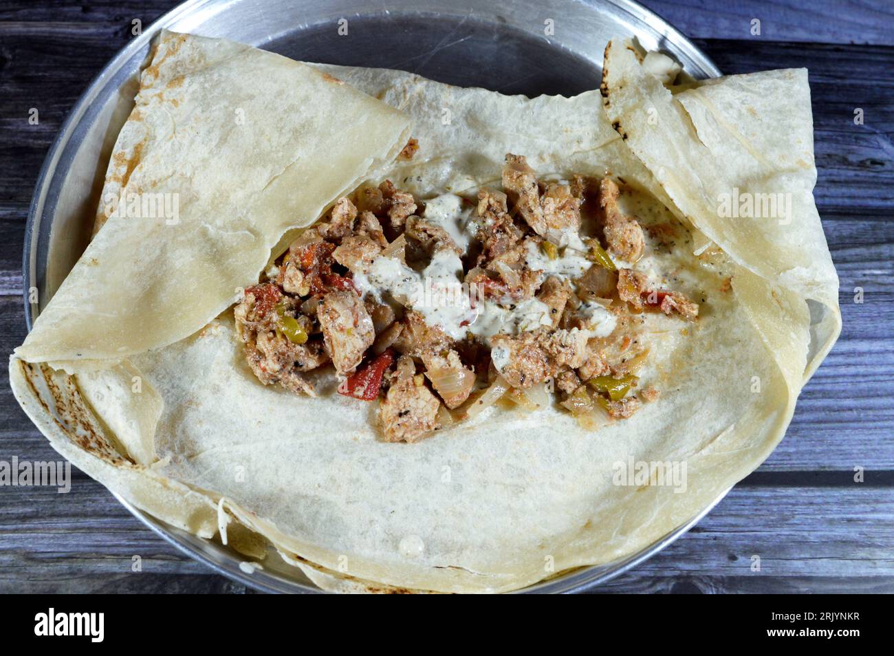 Preparing chicken wrap hi-res stock photography and images - Alamy