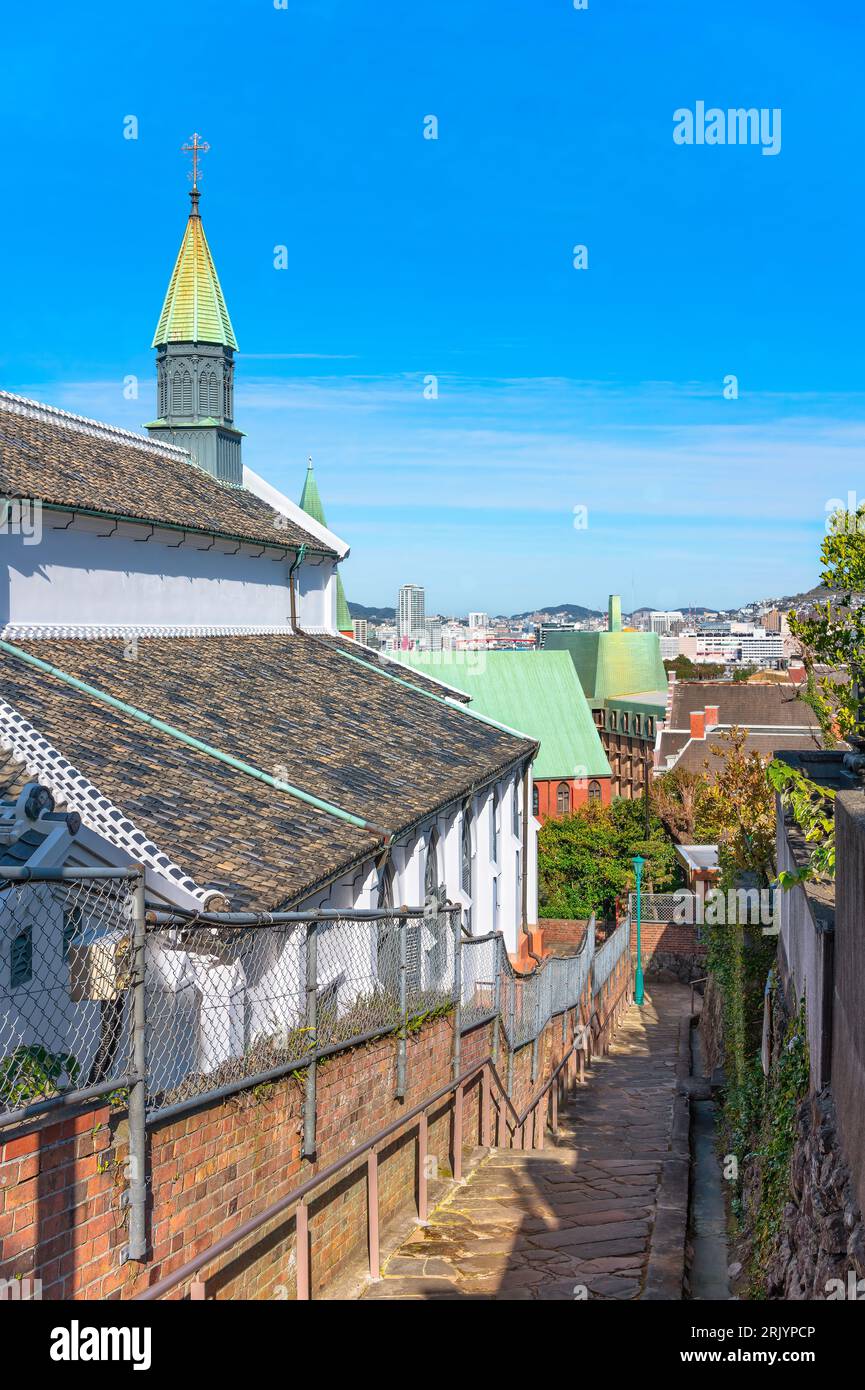 Narrow slope of cobble stairs Kinenzaka going down along the Japanese ...
