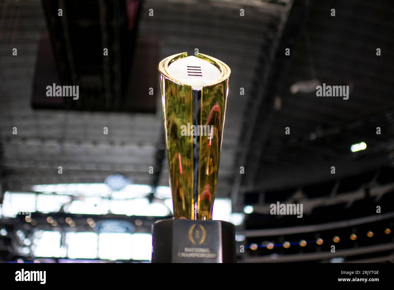 The college football championship trophy stands on display at the NCAA ...