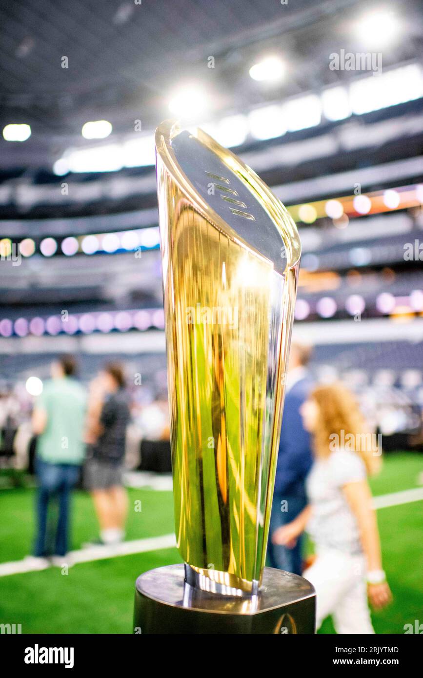 The college football championship trophy stands on display at the NCAA ...